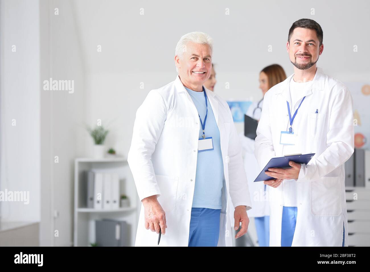 Professional male doctors in clinic Stock Photo - Alamy