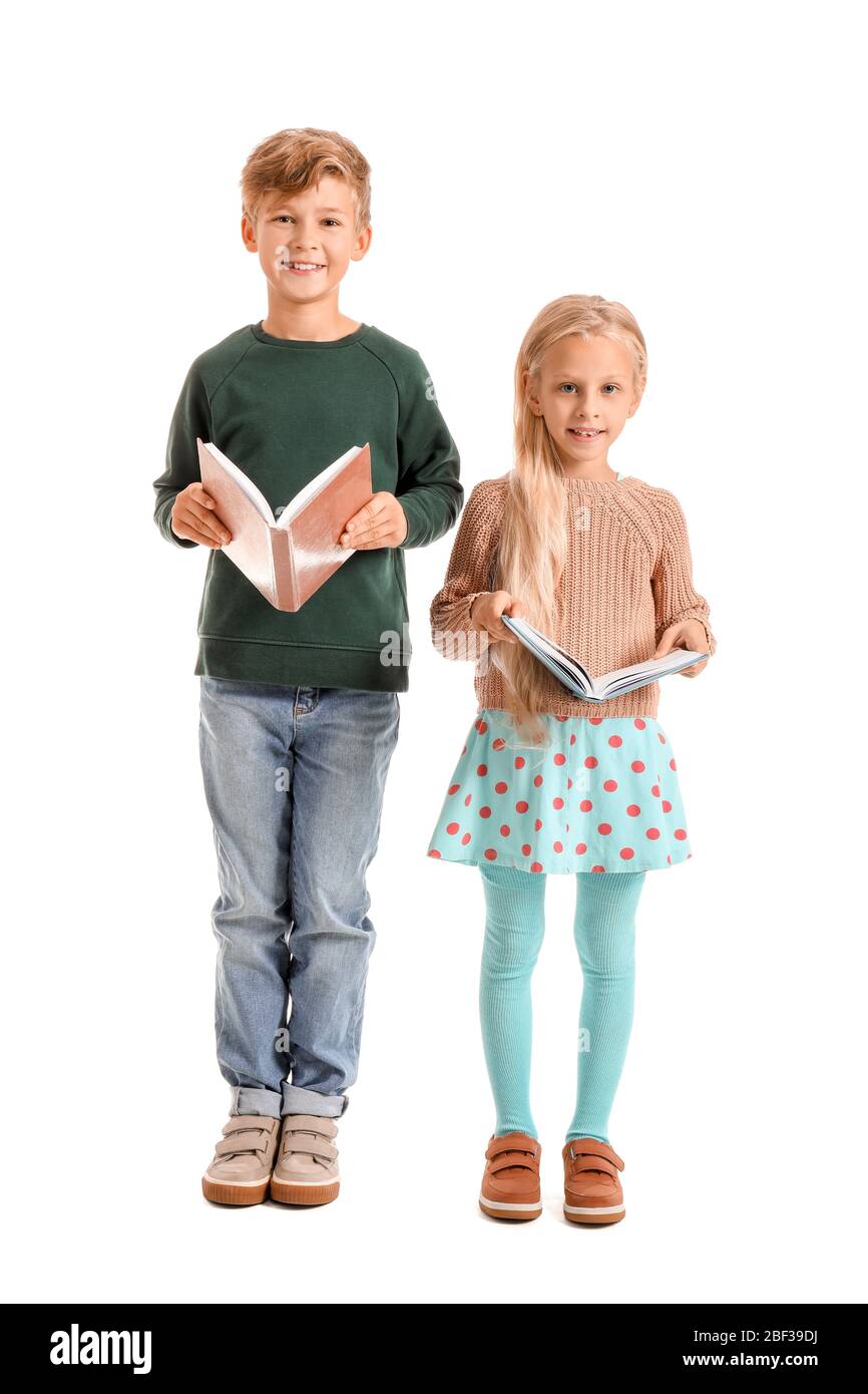 Little children with books on white background Stock Photo - Alamy
