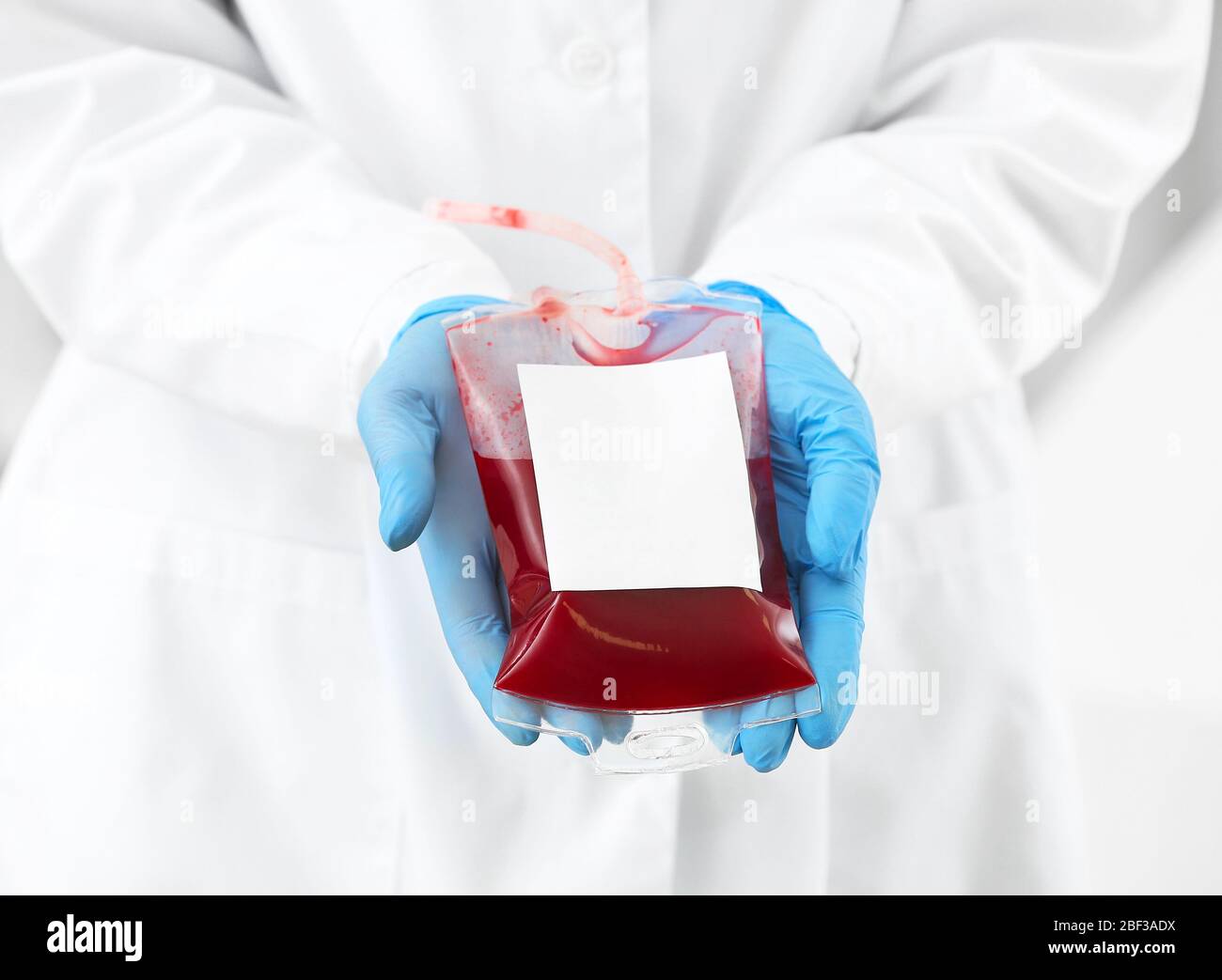 Female doctor with blood pack in hospital Stock Photo - Alamy