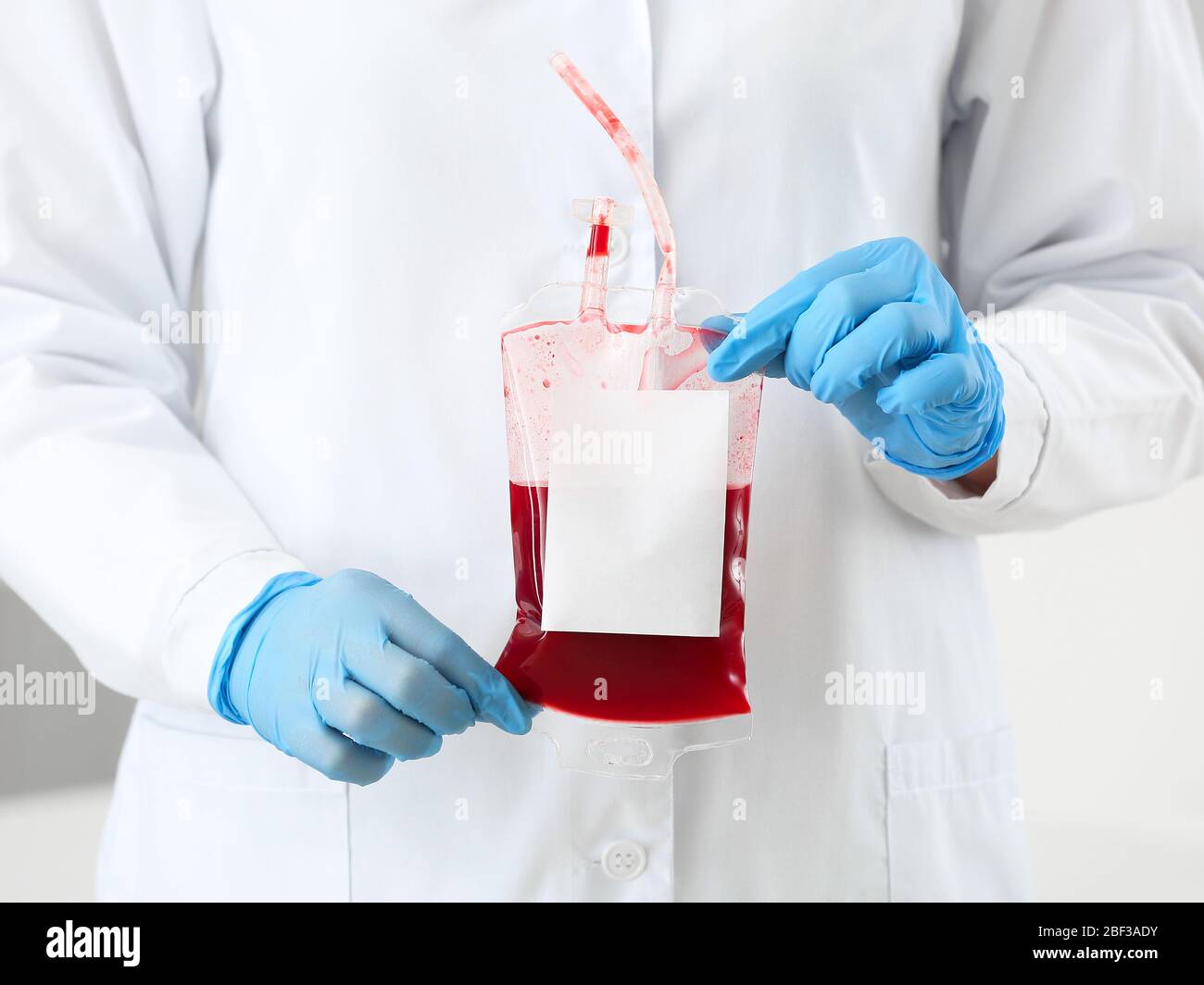 Female doctor with blood pack in hospital Stock Photo - Alamy