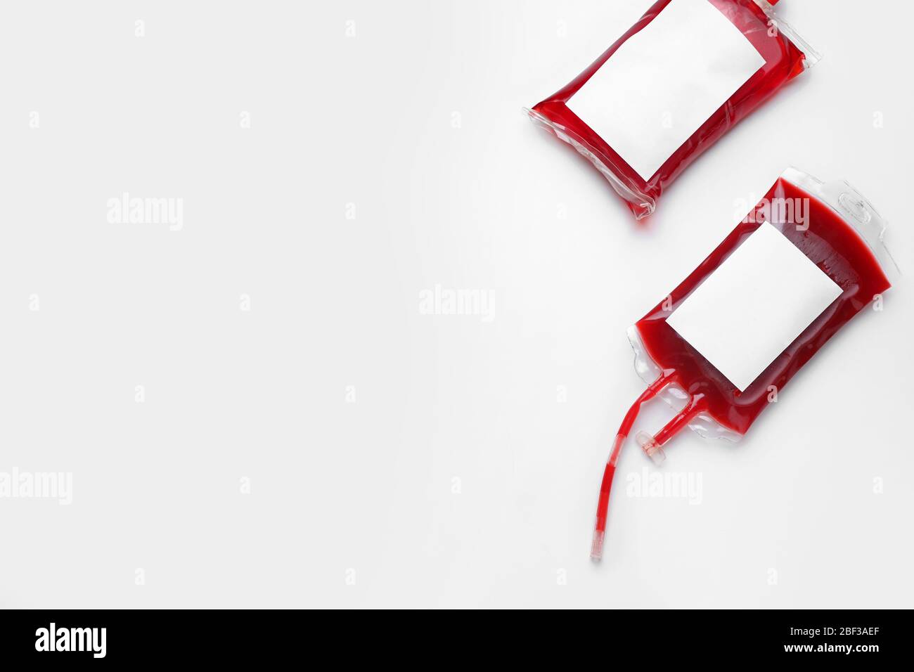Blood packs for transfusion on white background Stock Photo - Alamy