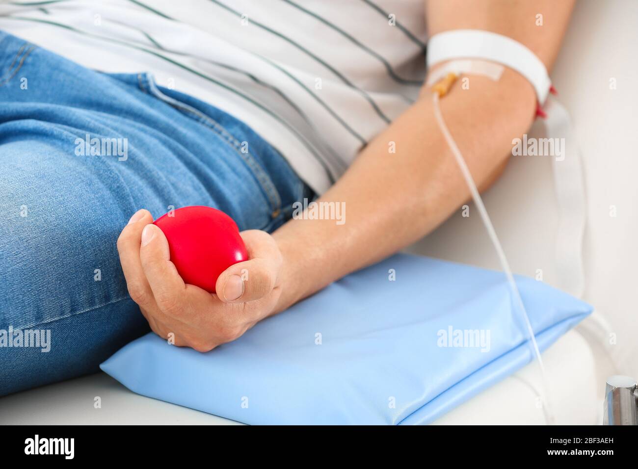 Man donating blood in hospital Stock Photo - Alamy