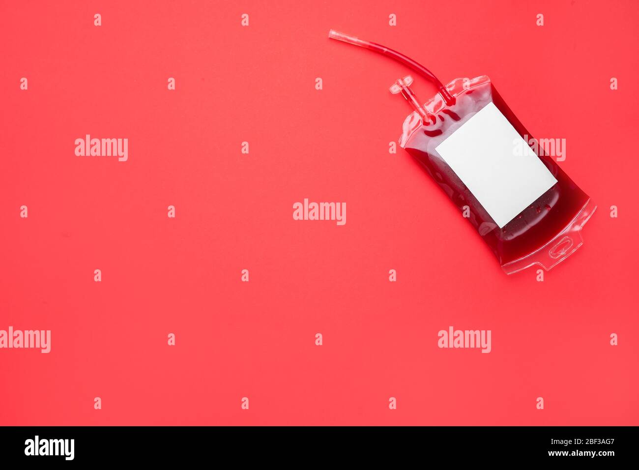 Blood pack for transfusion on color background Stock Photo - Alamy