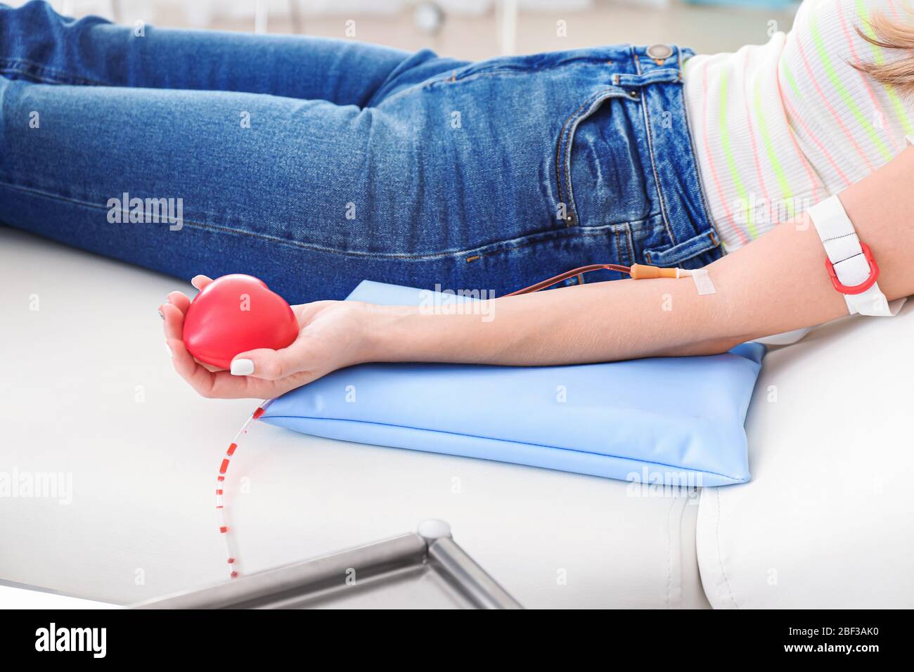 Hand donating blood help hi-res stock photography and images - Alamy