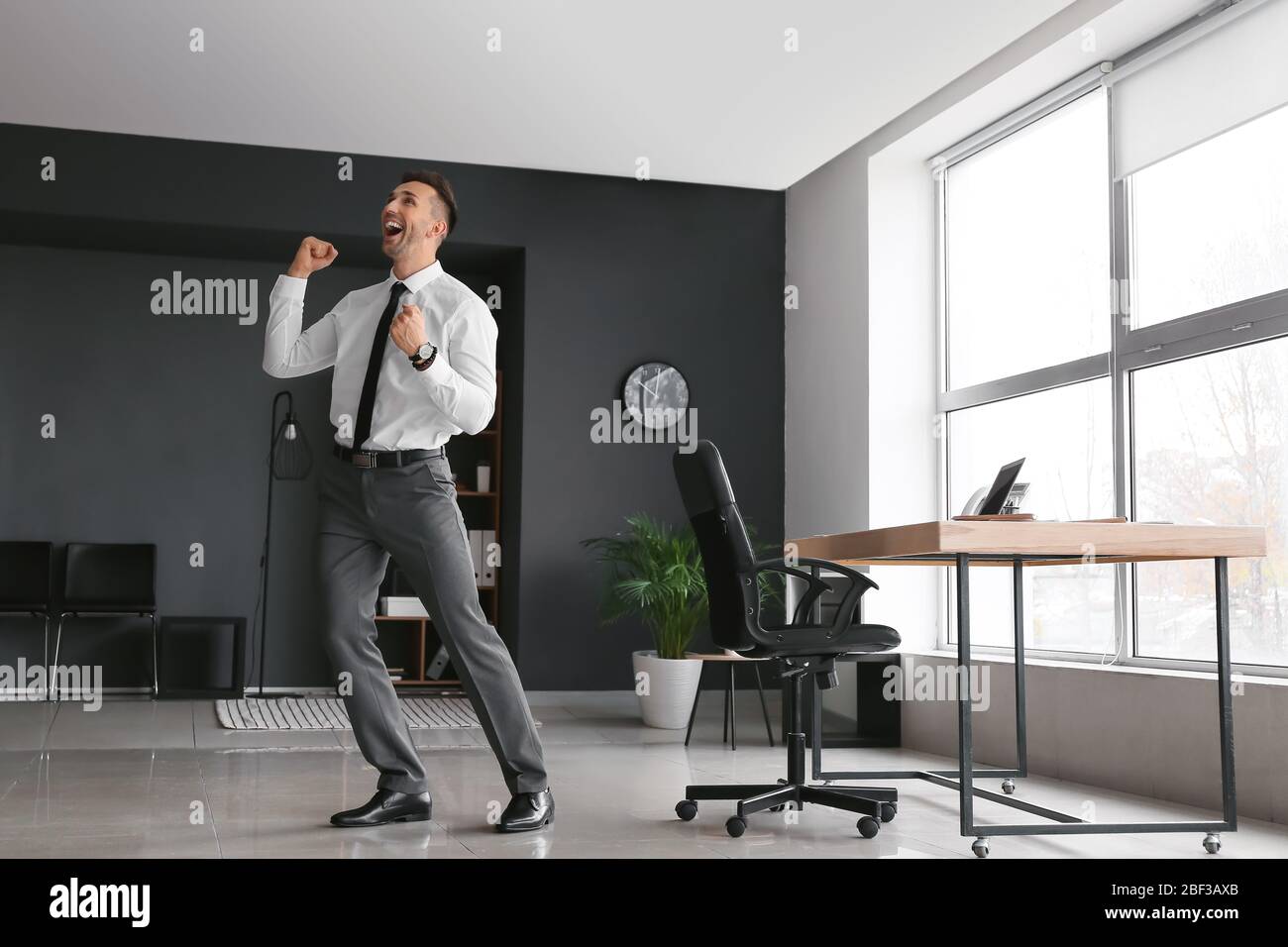 Funny caucasian young businessman dancing hi-res stock photography and ...