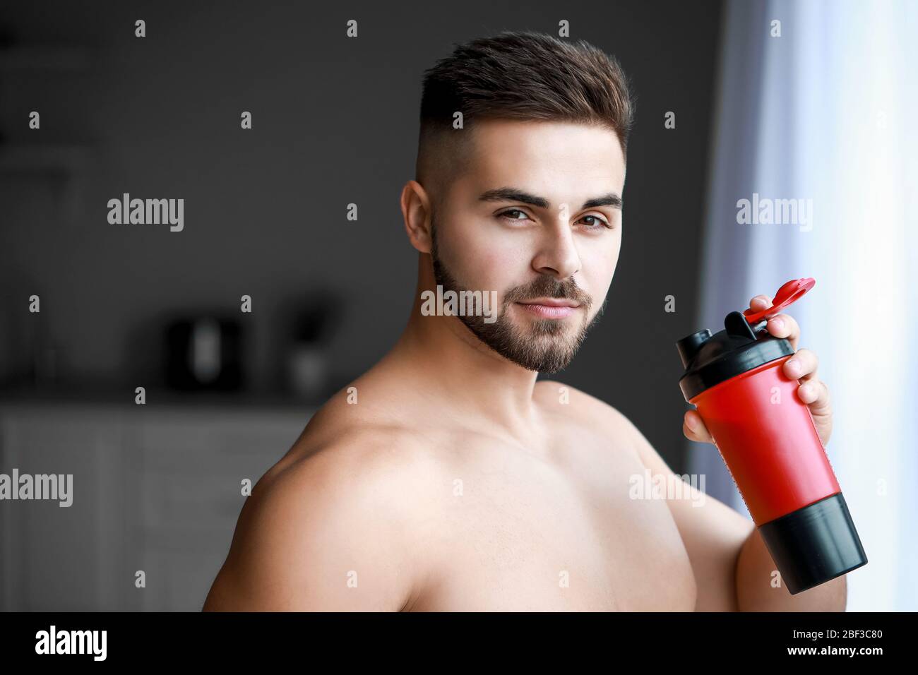 Man drinking protein shakes hi-res stock photography and images - Alamy