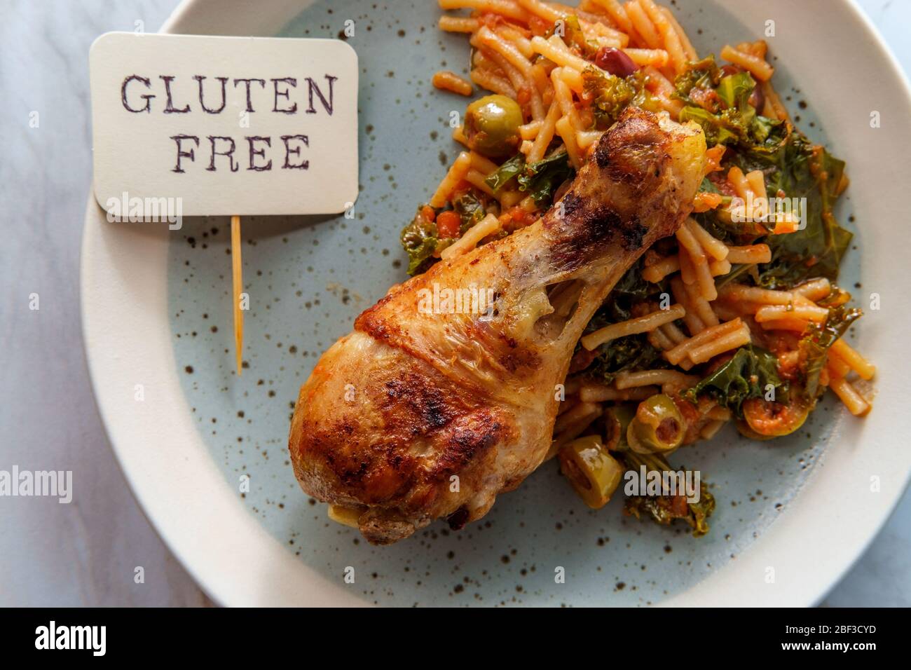 Spanish fideo con pollo chicken legs with vermicelli green olives and ...