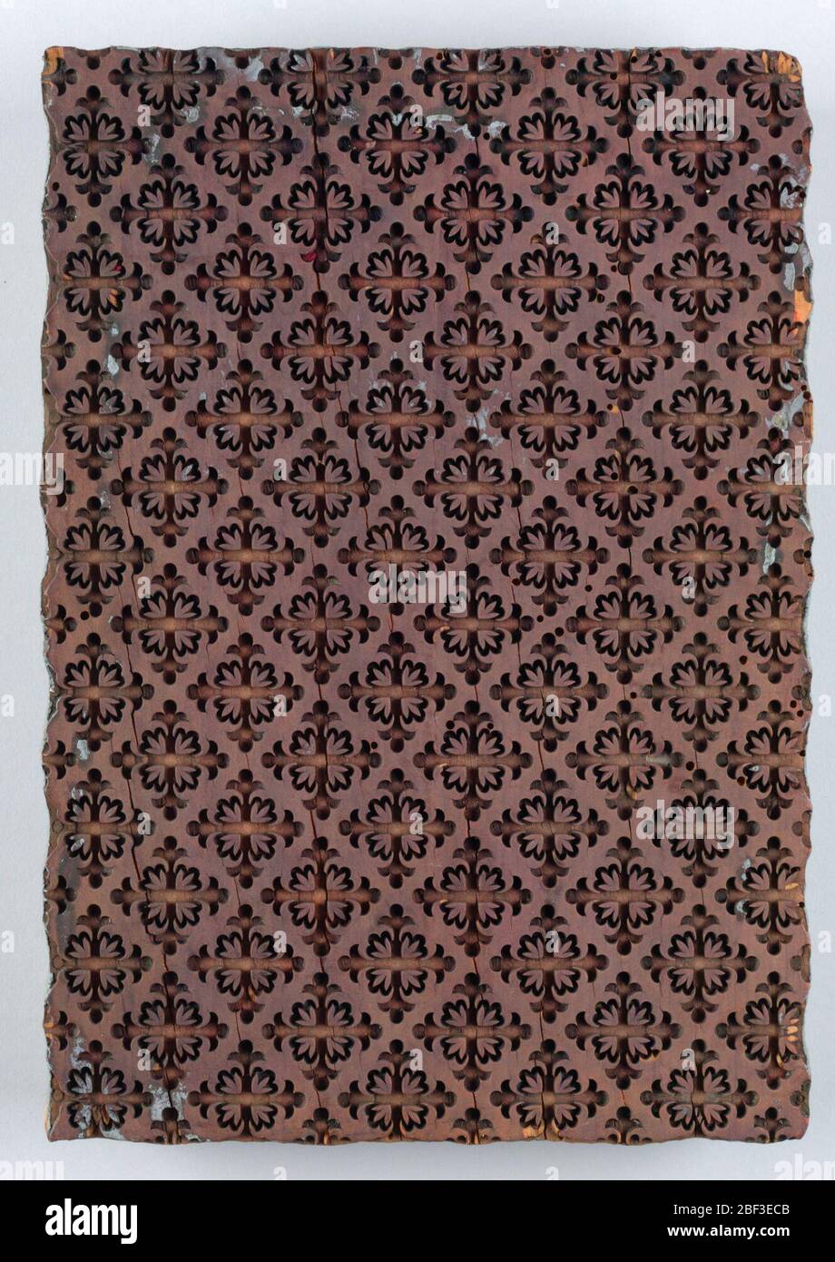 Printing block. Wooden block for printing fabric. Design in relief of a ...