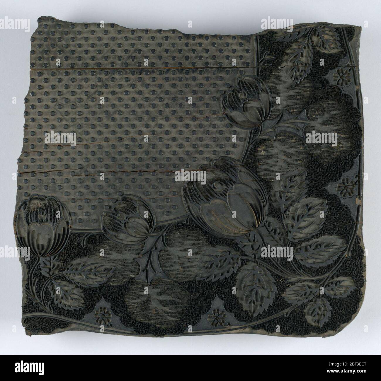 Printing block. Block for printing textiles with a pattern of tulips ...