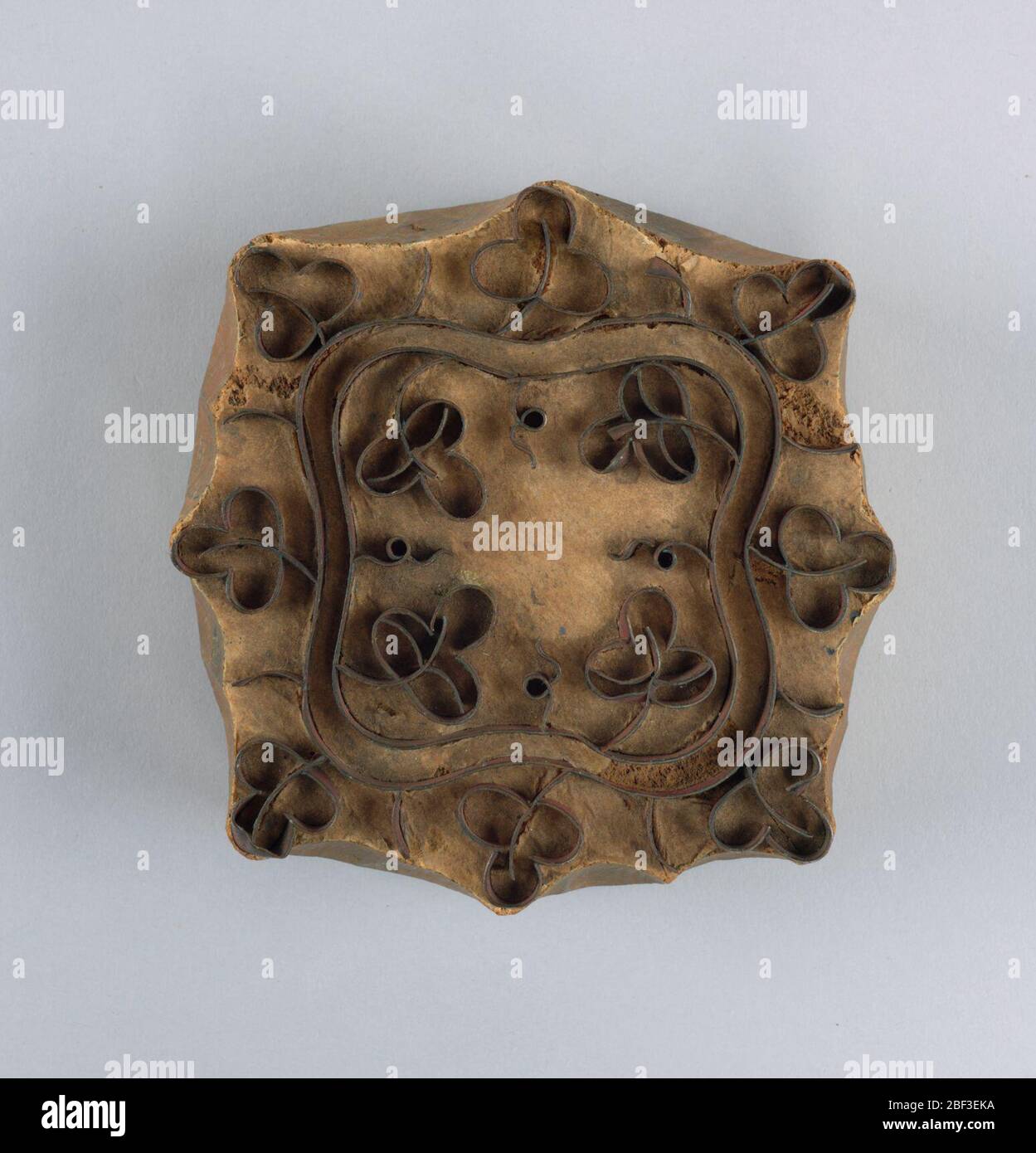 Priting block for embroidery. One of twenty-one wood blocks showing a ...