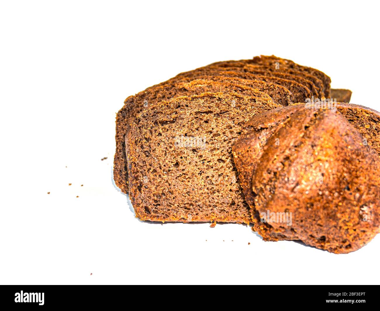 Sliced brown bread on a white background Stock Photo - Alamy