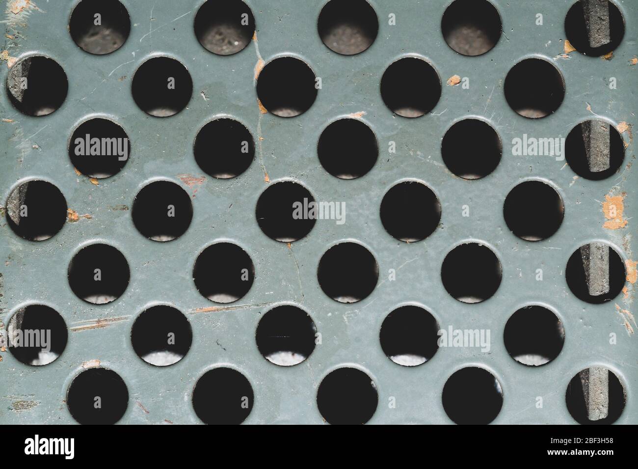 Metal plate with round holes hi-res stock photography and images - Alamy