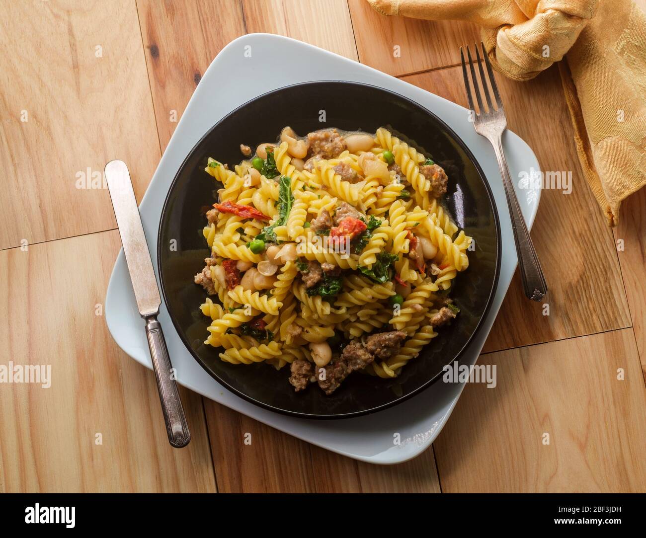 Italian kale sausage rotini pasta in white wine butter garlic sauce ...