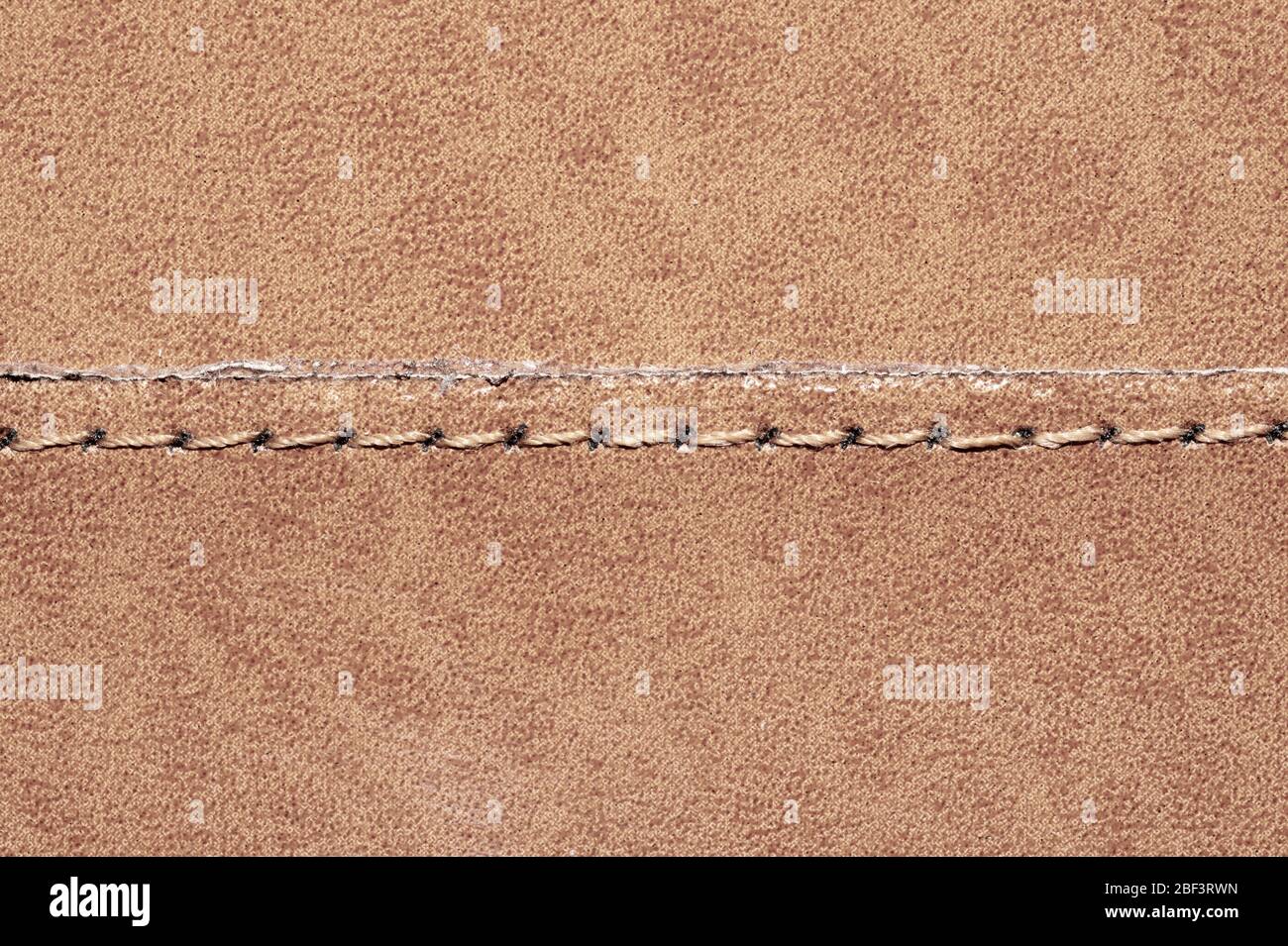 Brown leather texture with a linear stitch. material with seam Stock ...