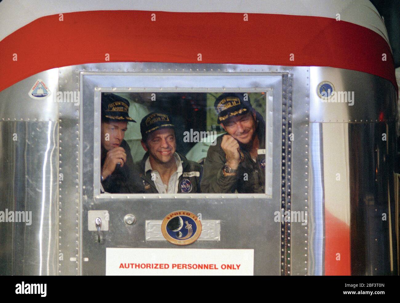from left to right, astronauts Stuart A. Roosa, command module pilot ...