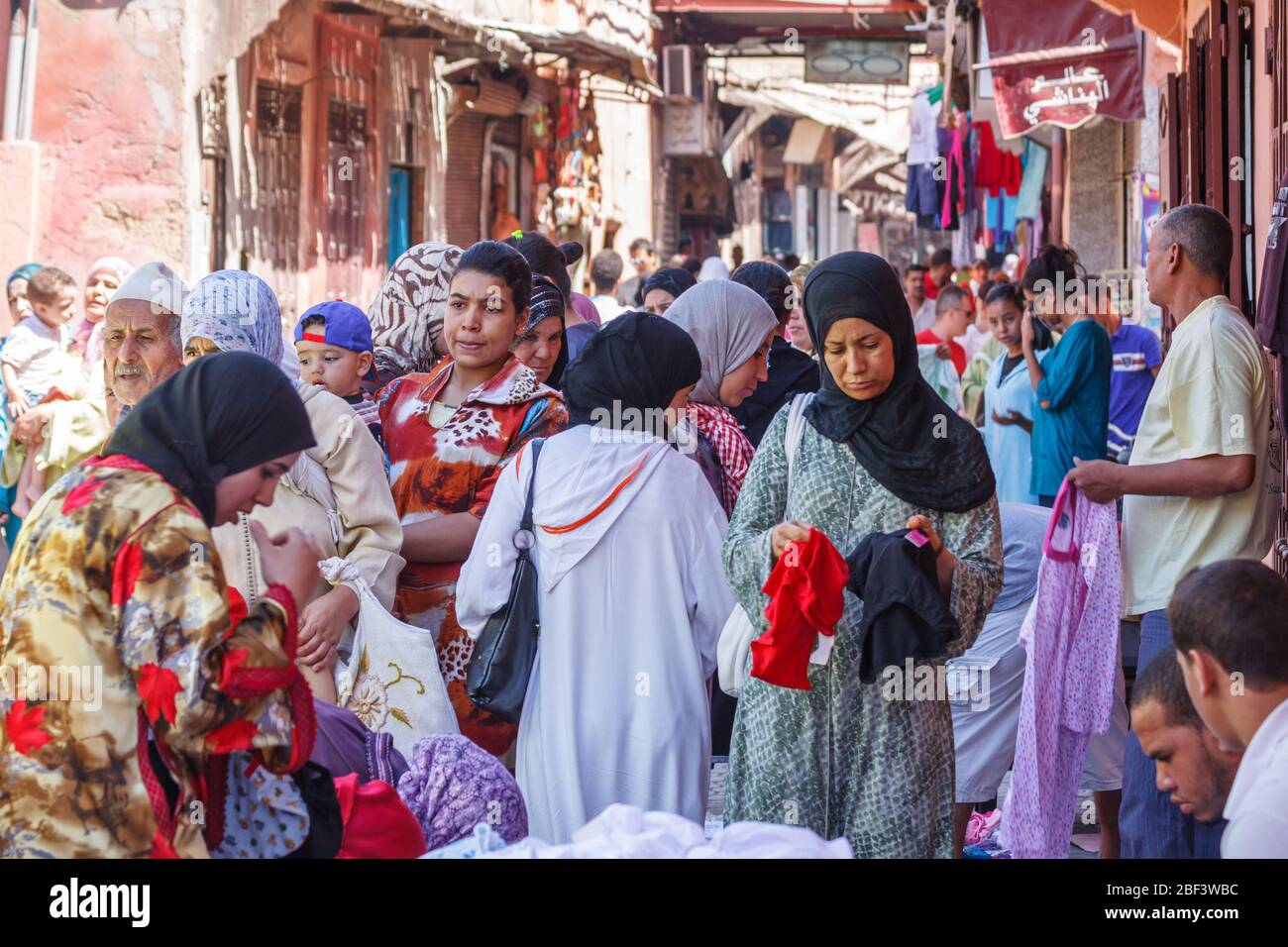 Marrakesh, Morocco - September 8th 2010: People in a busy street market ...