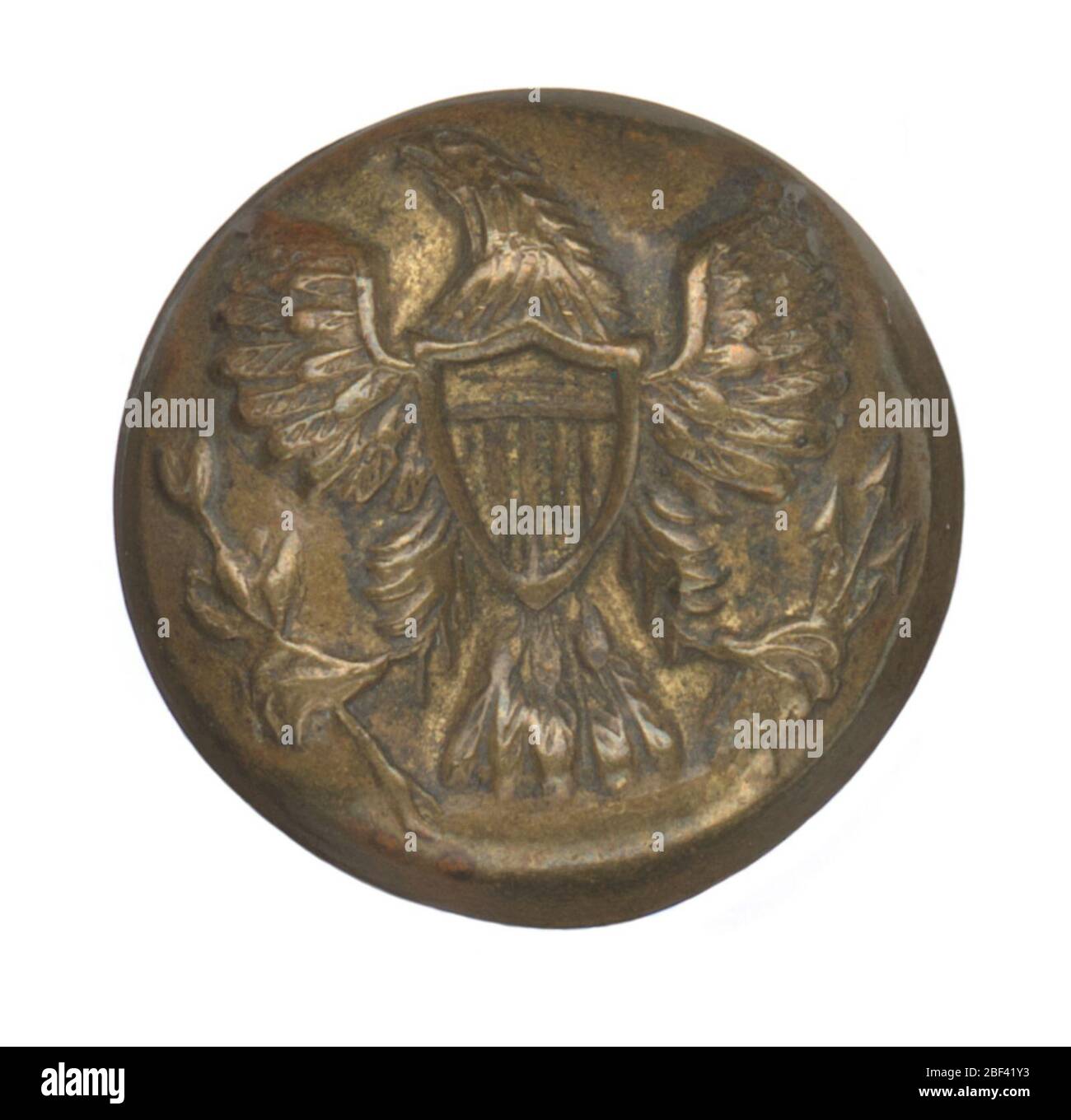 Stamped brass uniform button with American eagle. This small brass ...