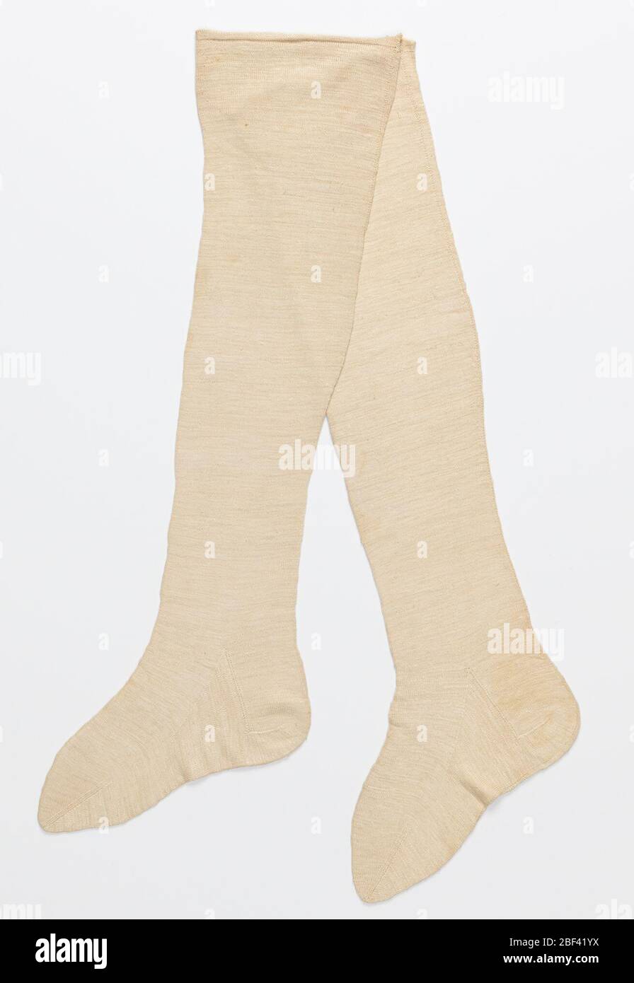 Stockings. Pair of cream-colored handknit stockings Stock Photo - Alamy