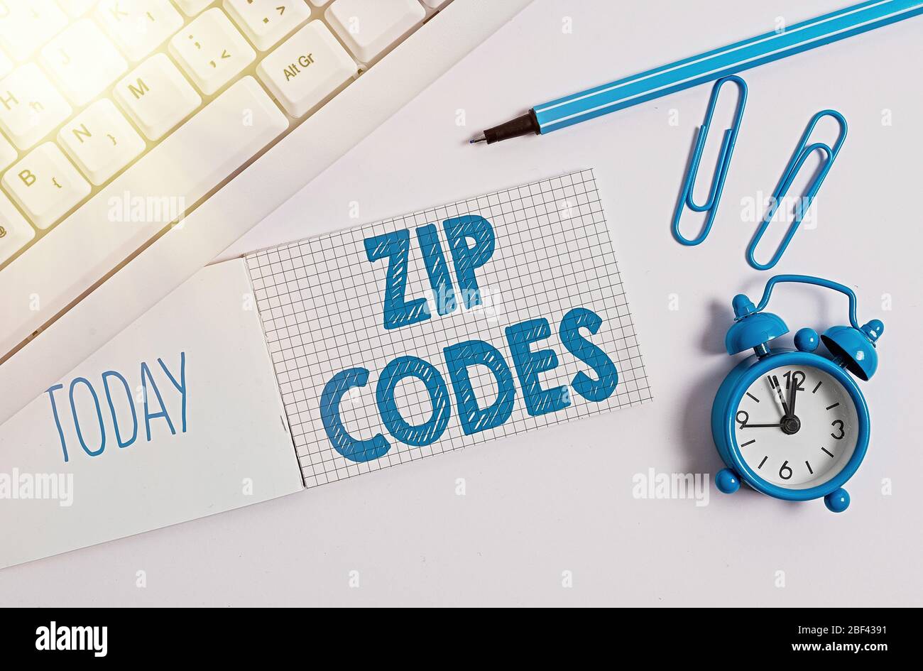 Writing note showing Zip Codes. Business concept for numbers added to a ...