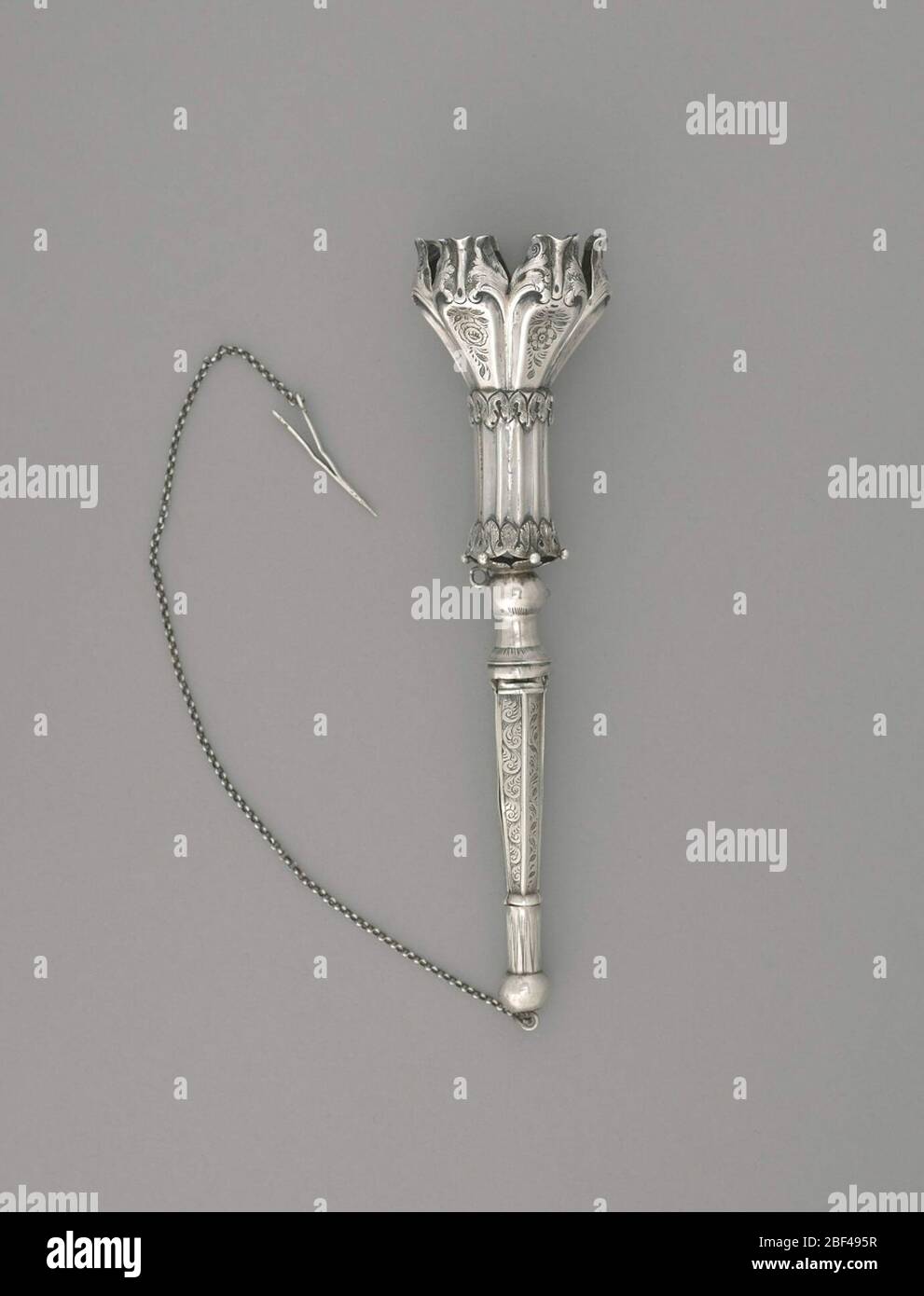 Bouquet holder tripod flower motif. Silver vase with tripod stand. The ...