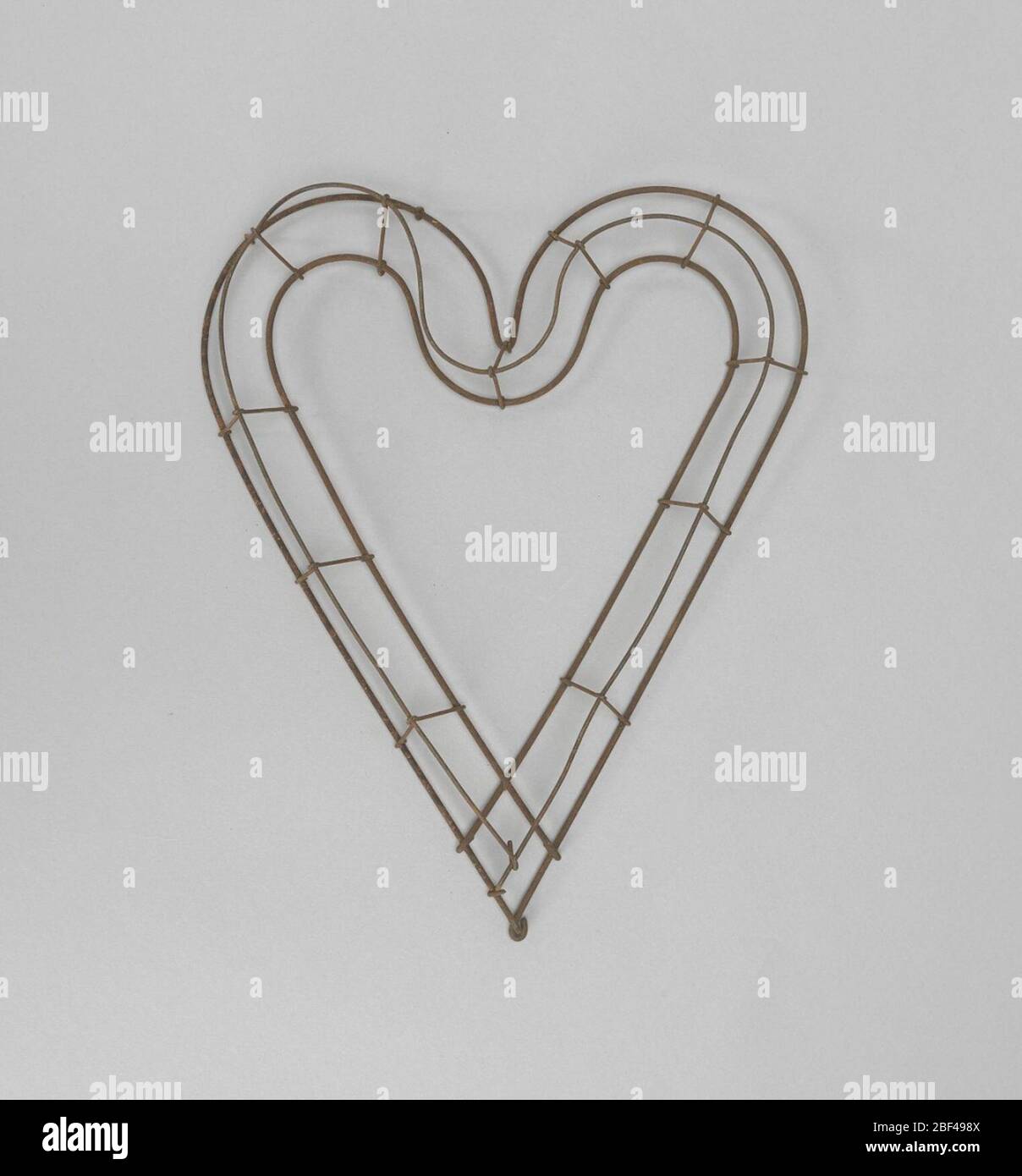 Wire frame heart. Heart floral designs came in a variety of styles and ...