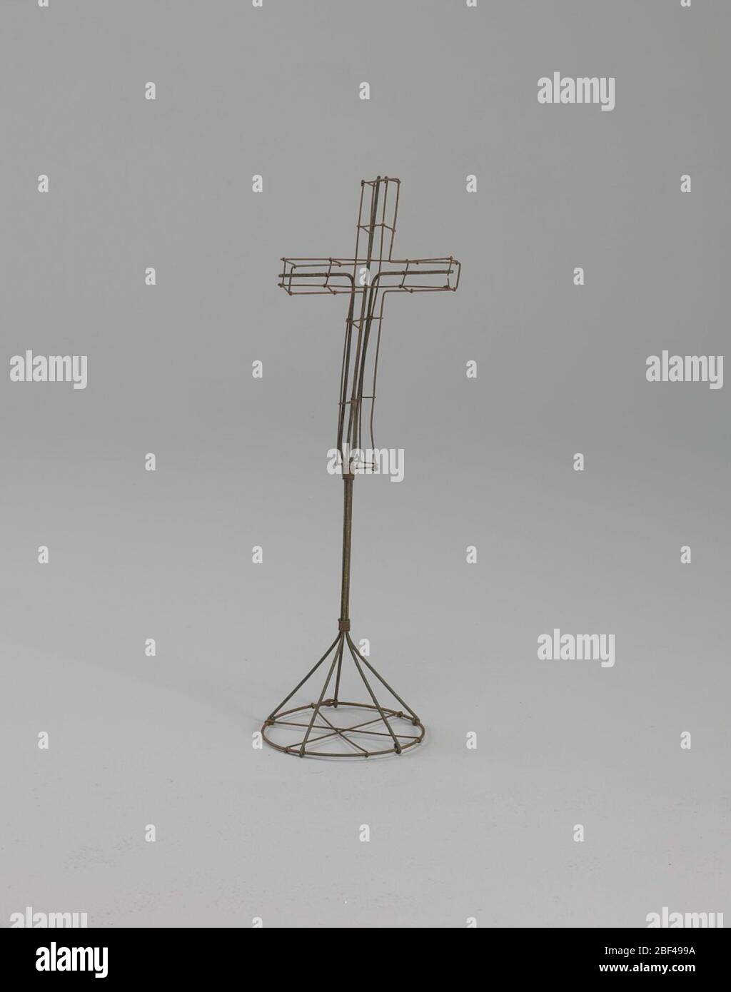 Wire frame cross on stand. The Cross was one of the most frequently ...