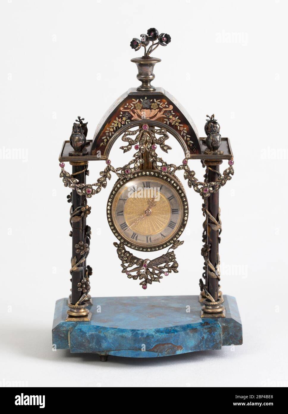 Clock. Architectural structure holding circular clock, its border ...