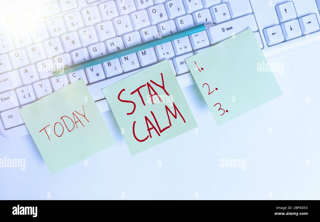 Text sign showing Stay Calm. Business photo showcasing Maintain in a ...