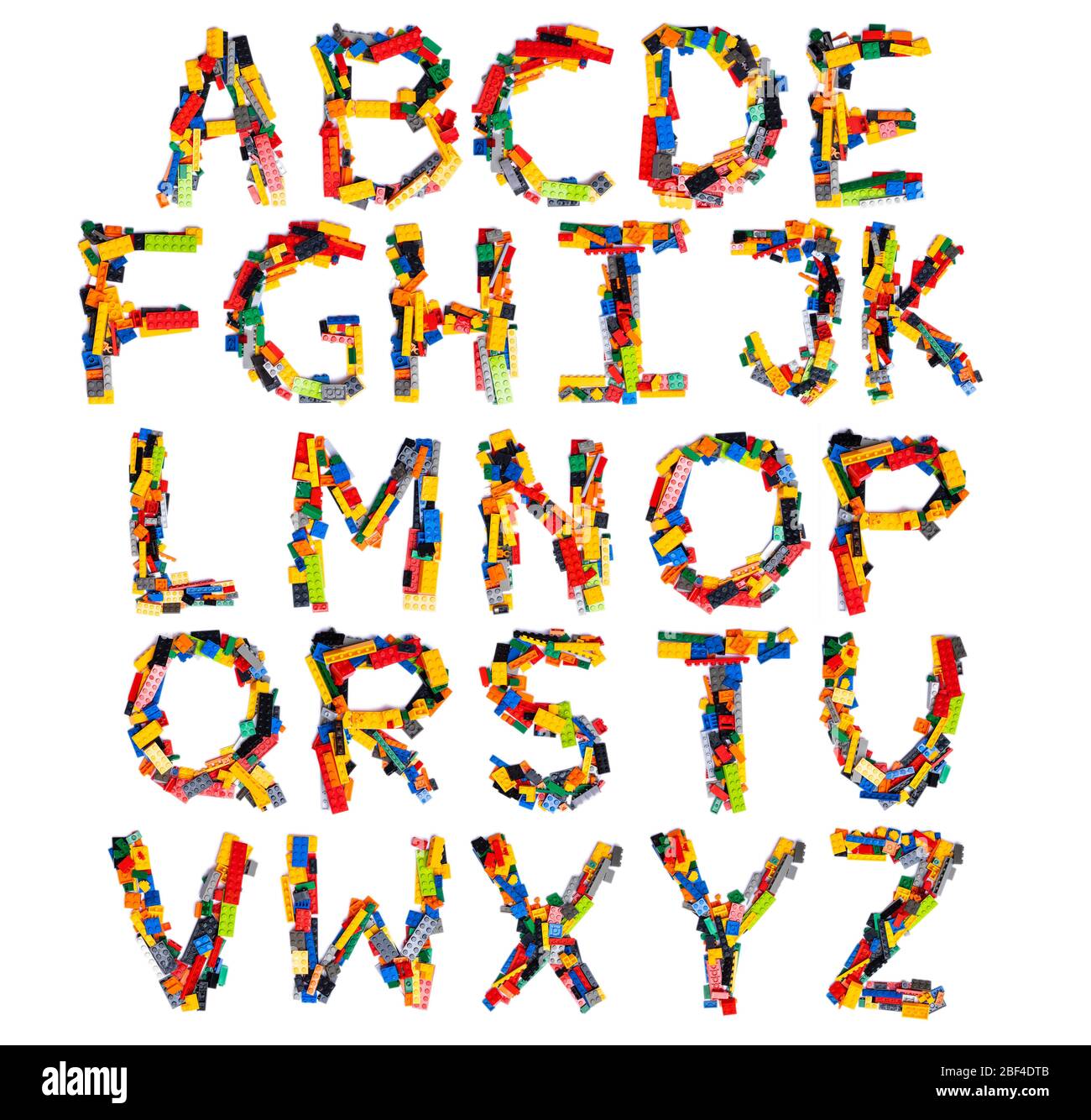 English alphabet from multi-colored children's plastic constructor on a ...