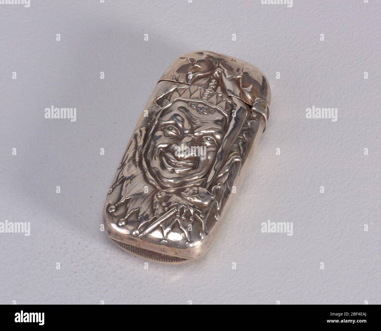 Jester Face. Oblong, rounded corners, featuring raised decoration of ...