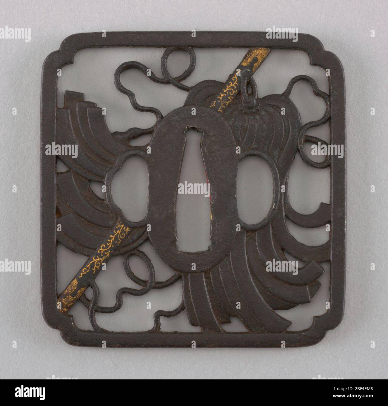 Tsuba. This iron tsuba is kaku mokko (square with lobed corners) in ...