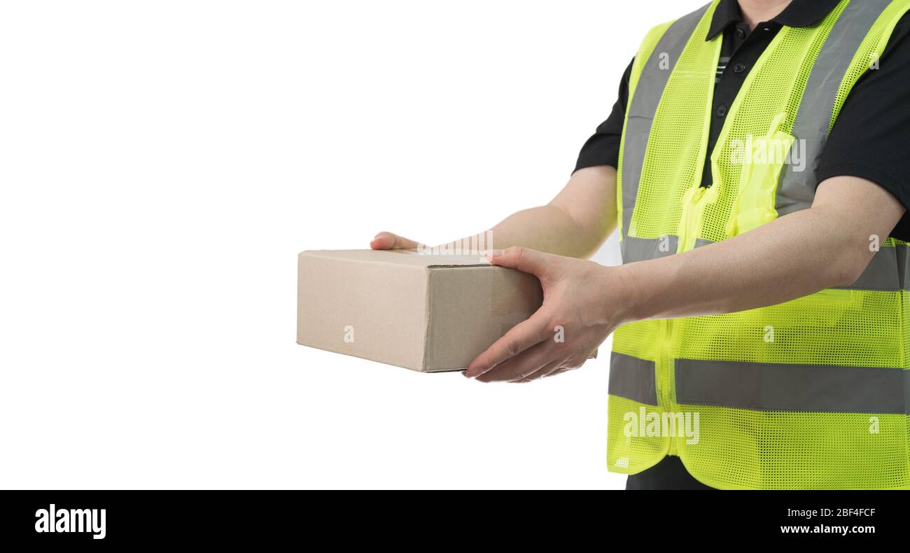 delivery man holding a big parcel isolated on white background Stock ...