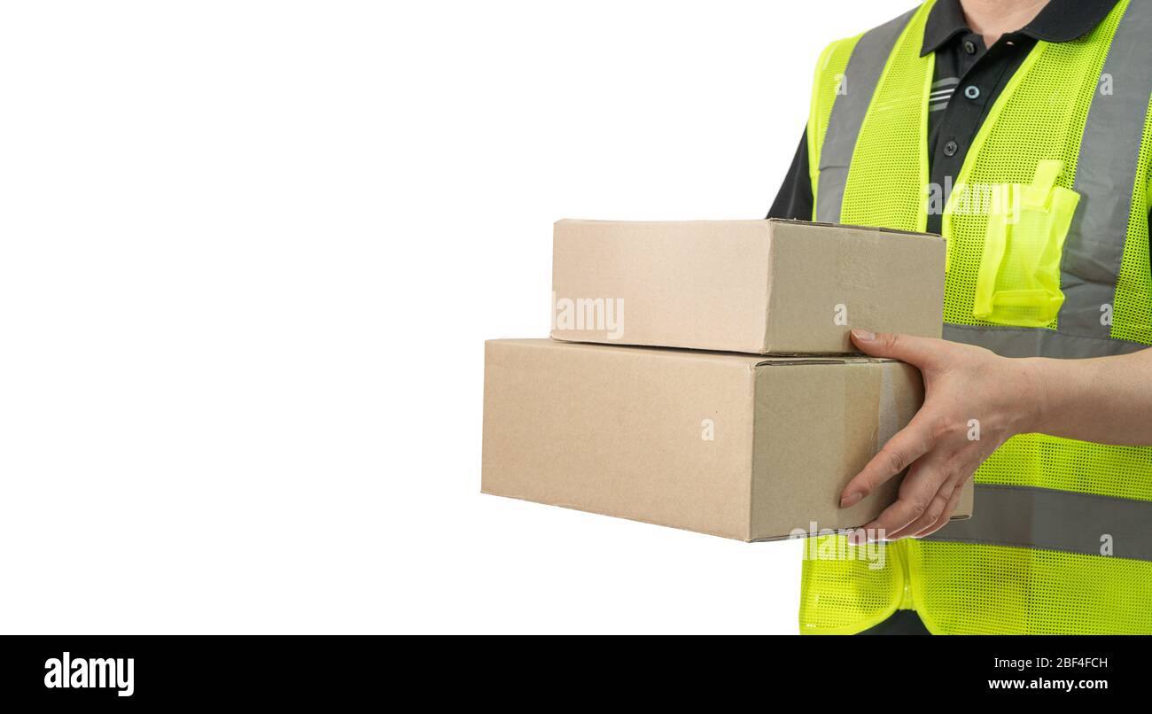 delivery man holding a big parcel isolated on white background Stock ...