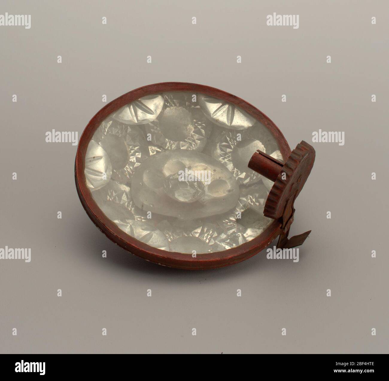 Sconce and socket. (A1) circular concave reflector made of tin discs ...