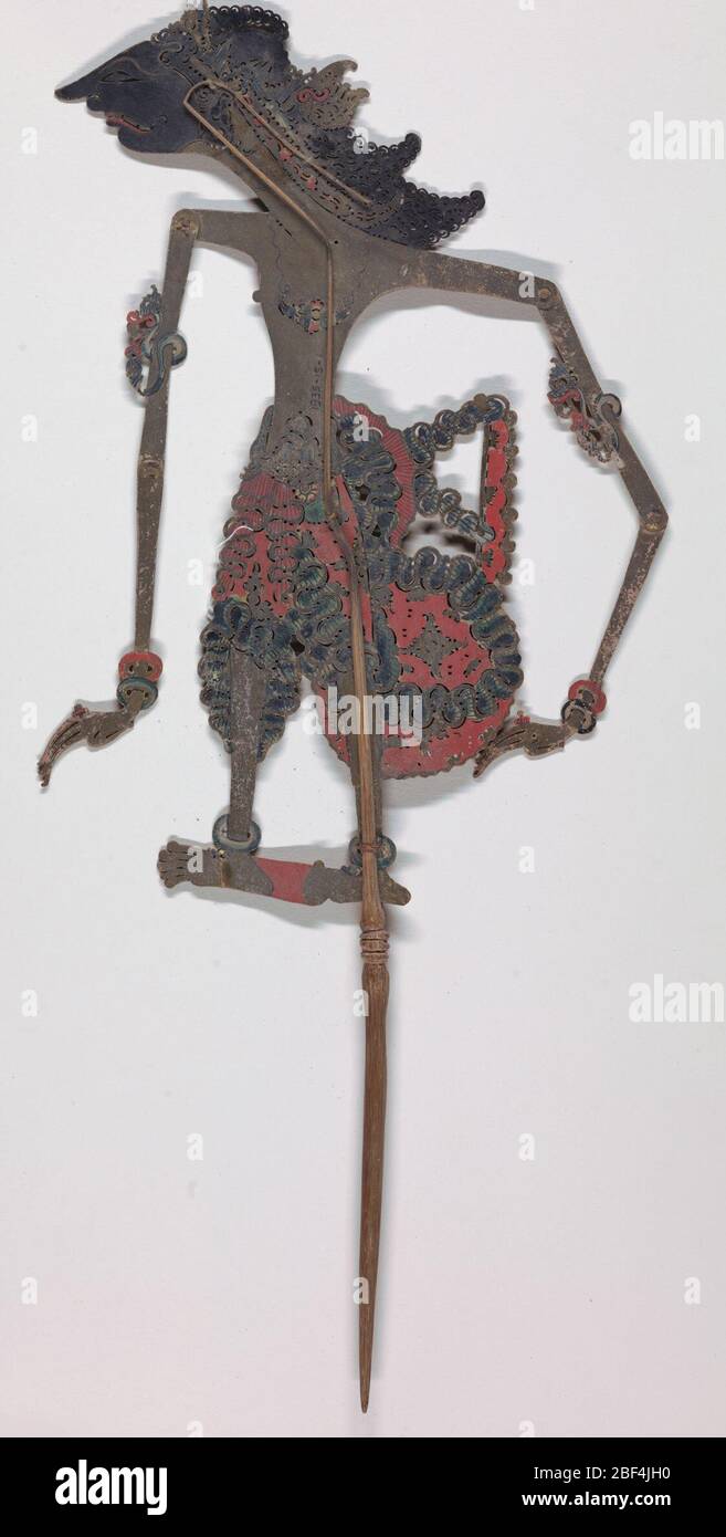 Shadow puppet wayang kulit. Female figure with elaborate coiffure ...