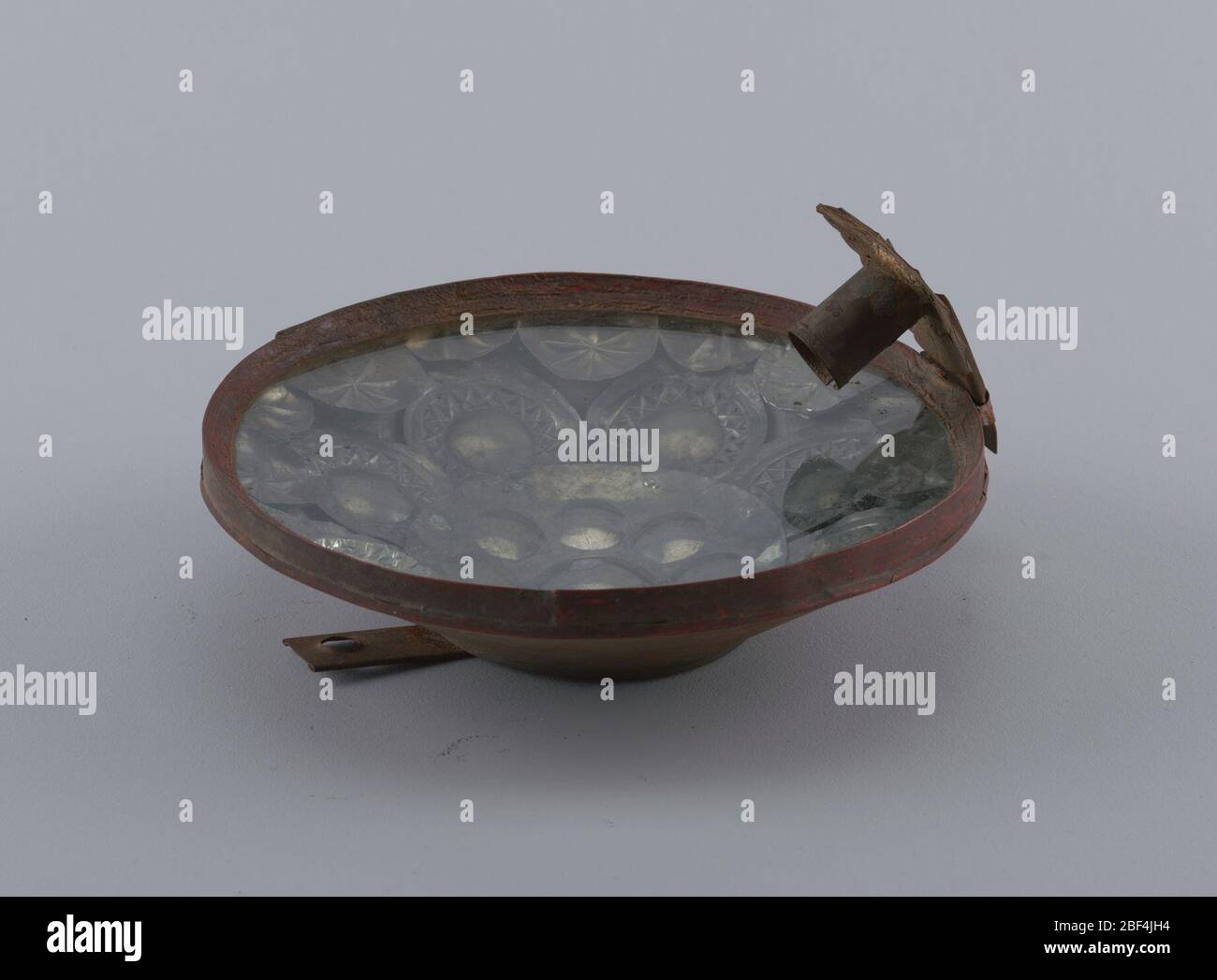 socket. Candle sconce (a) with attached socket (b). a: circular ...