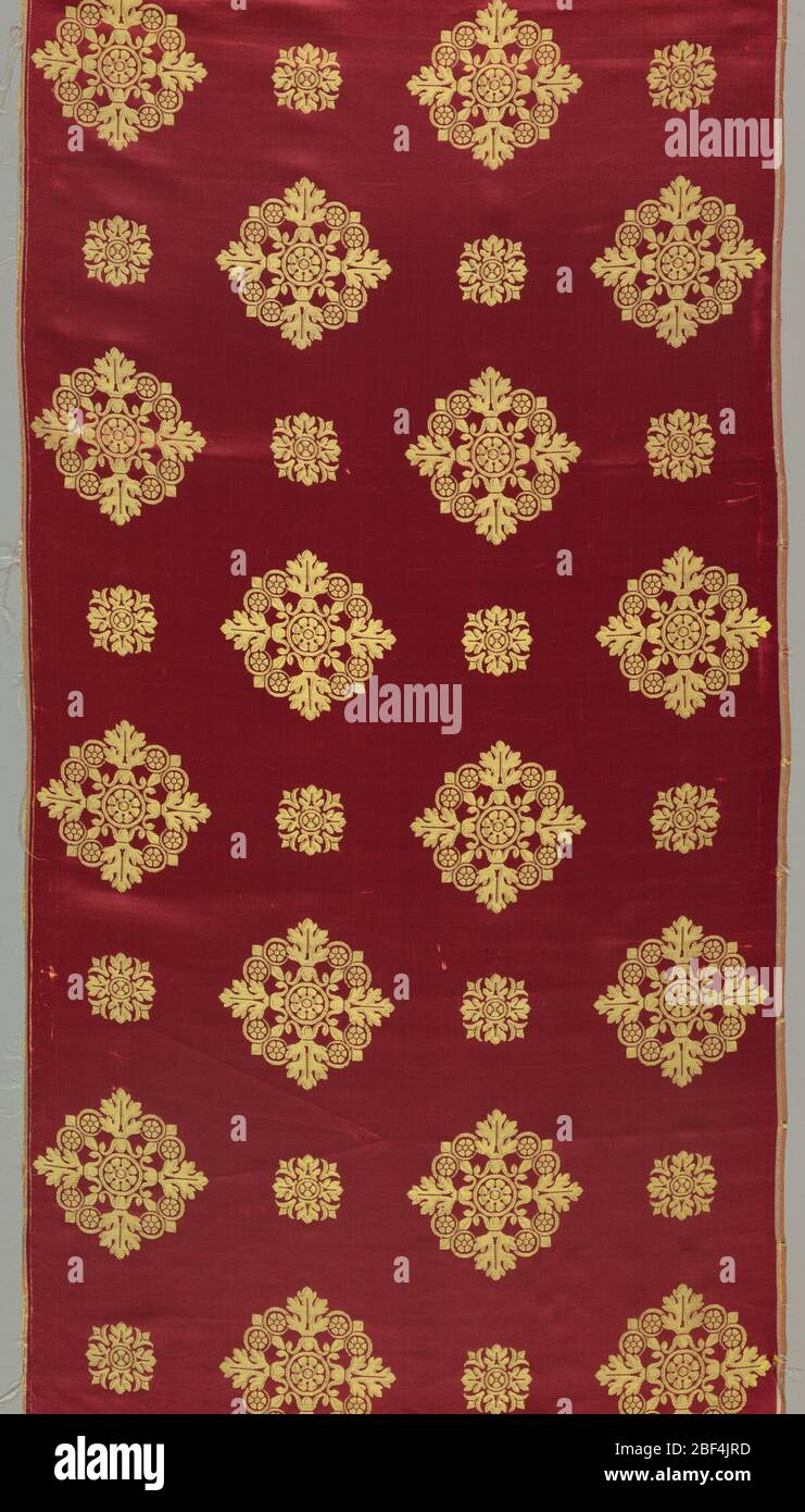 Textile. Bright deep red with bright yellow rosettes in two sizes Stock ...