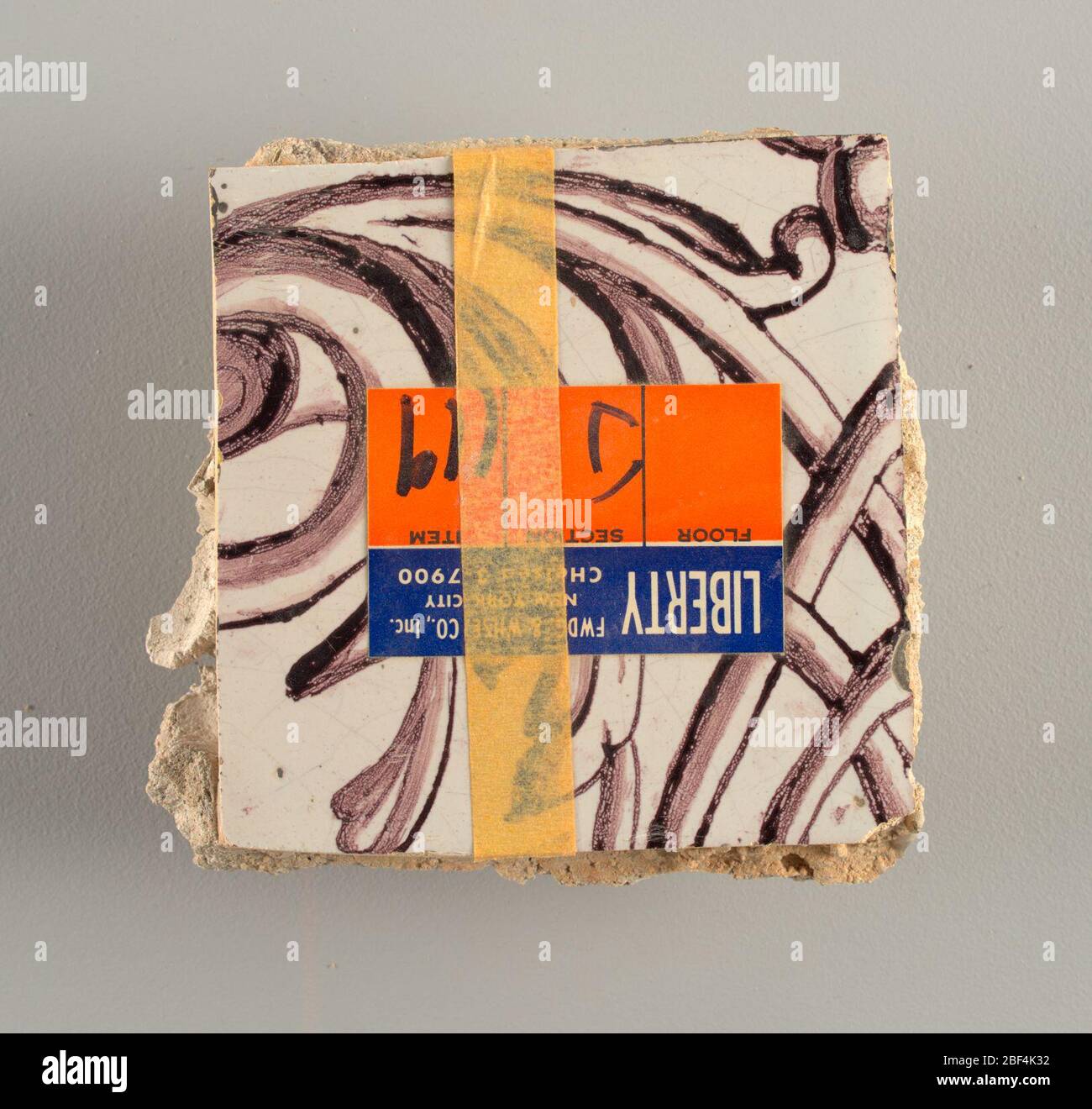 Wall facing. Two vertical rectangles, twenty-three tiles high. A) Nine ...