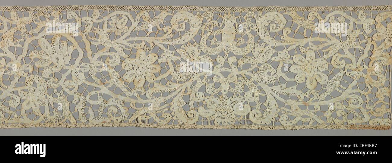 Border. Border with a design of a symmetrical curving floral vine ...