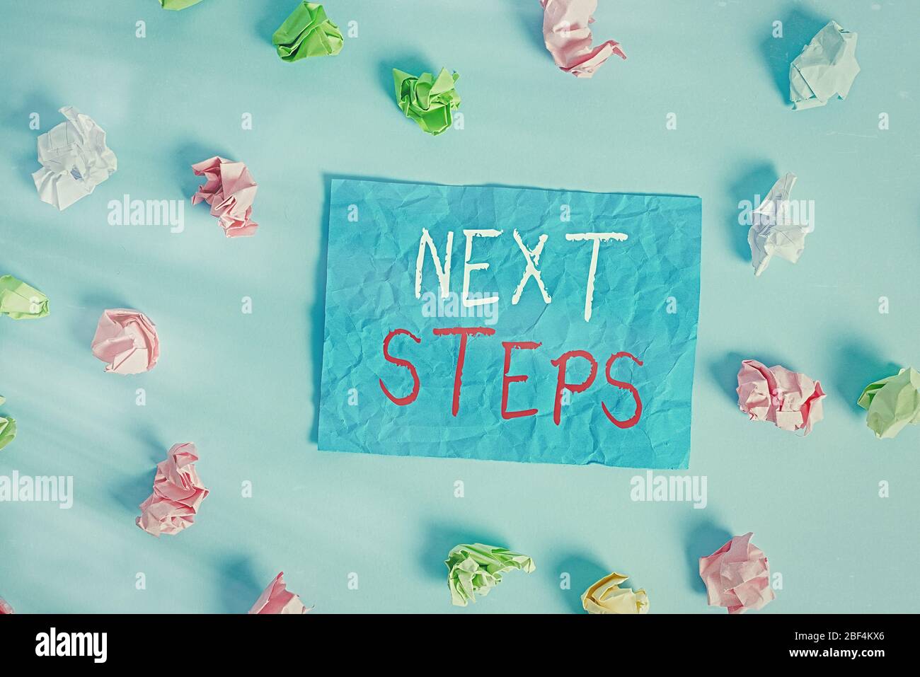 Writing note showing Next Steps. Business concept for numper of process ...