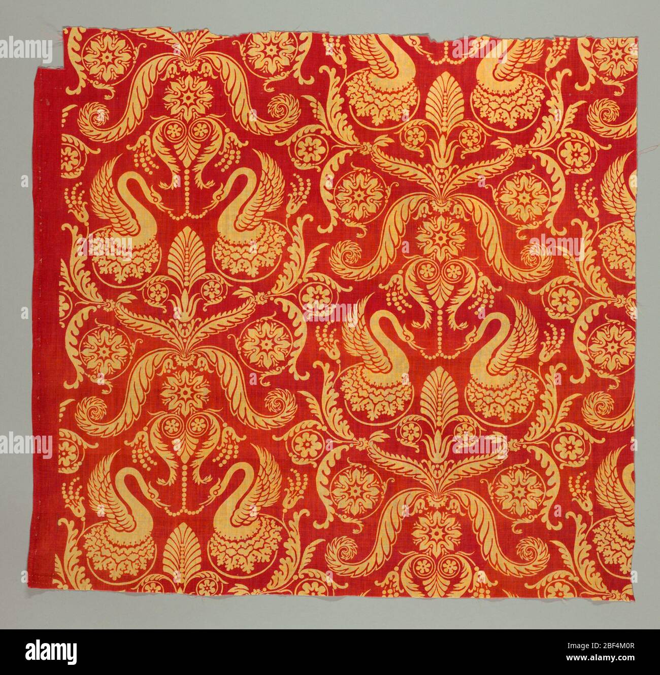 Textile. Fragment of cotton, close tabby weave, bright red background ...