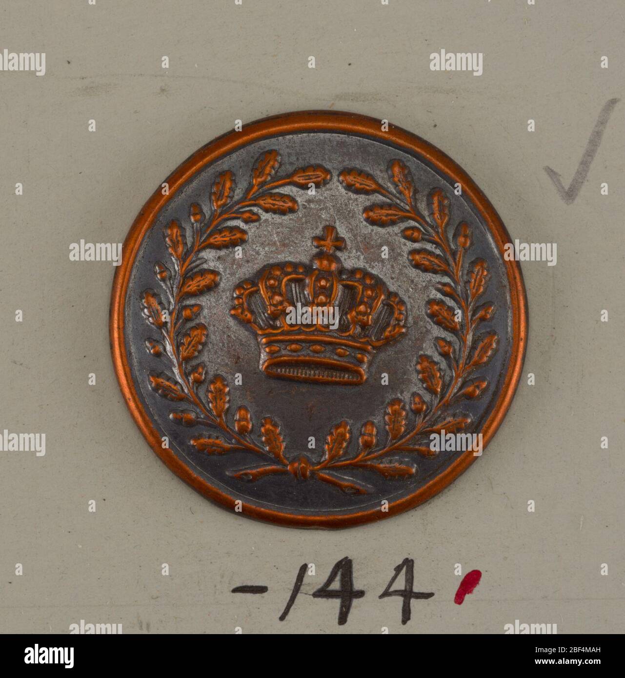 Button. Button ornamented in design of a crown within crossed laurel ...