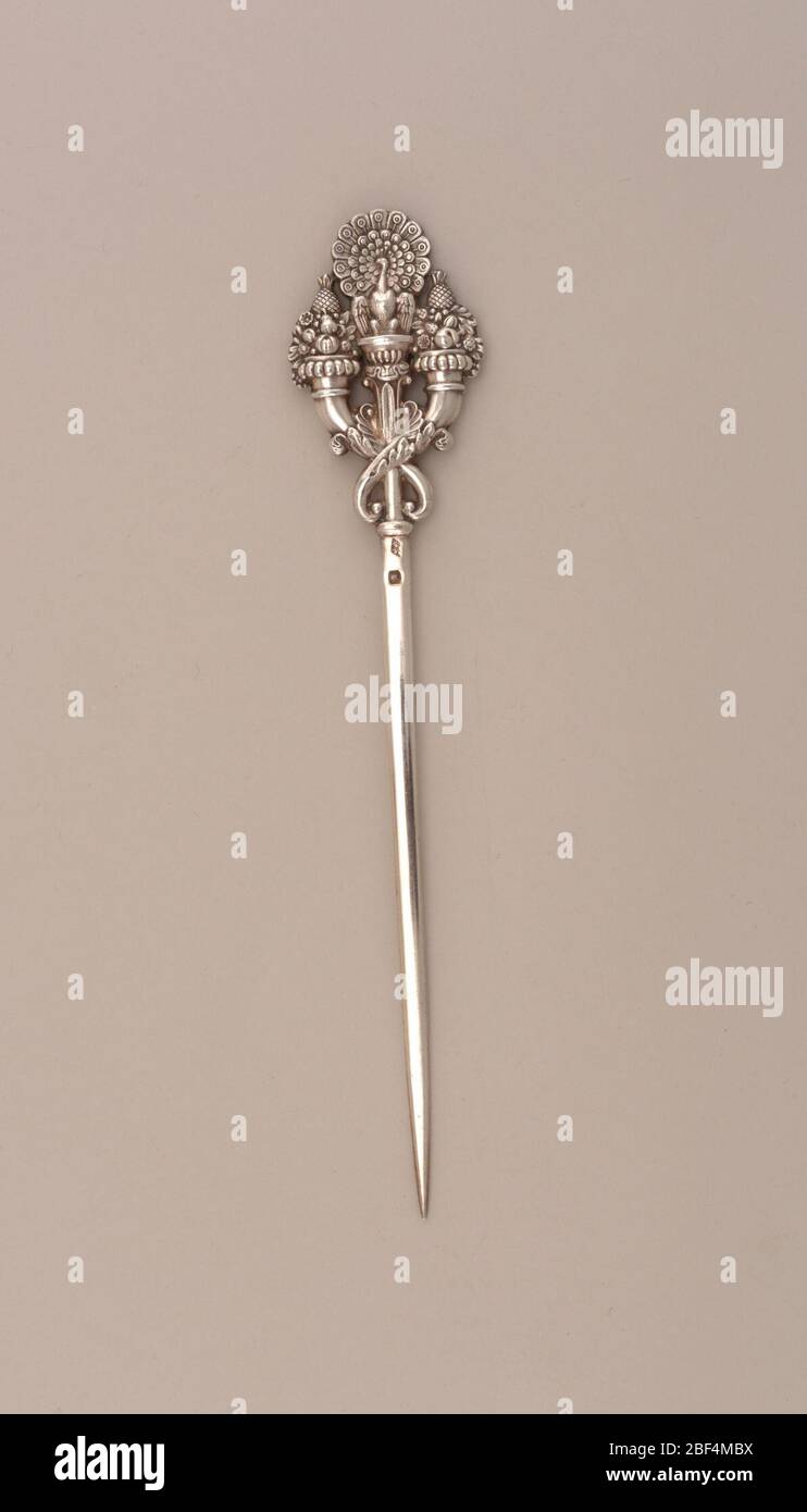 Skewer. Tapering blade or pin with terminal in relief cast with ...