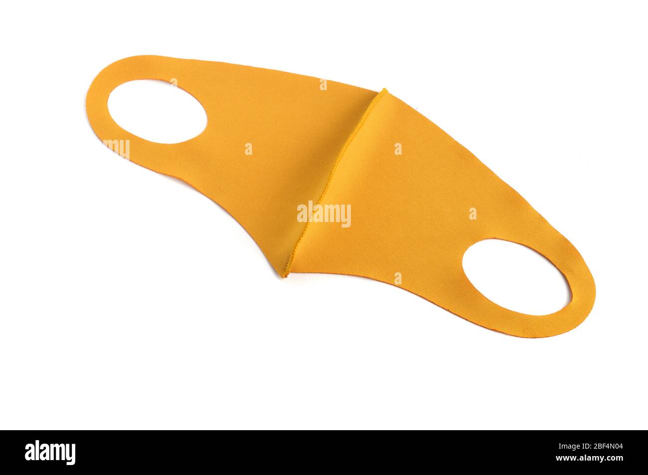 Yellow cloth mask isolated on white background Stock Photo - Alamy