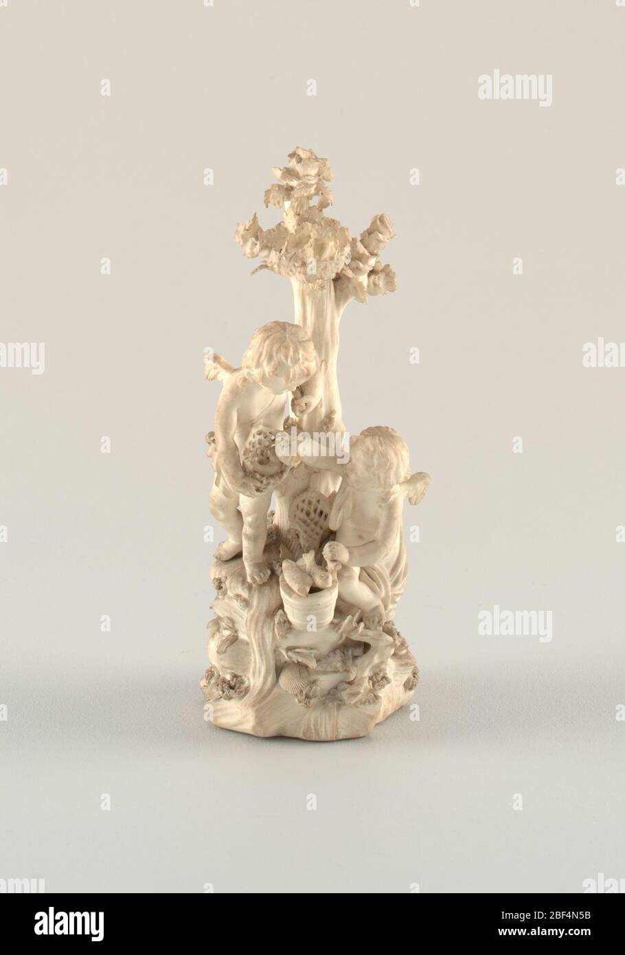 Seated cherub transfers fish hi-res stock photography and images - Alamy