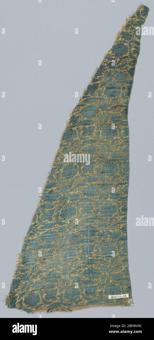Fragment. Blue silk ground with illegible design of closely-spaced ...
