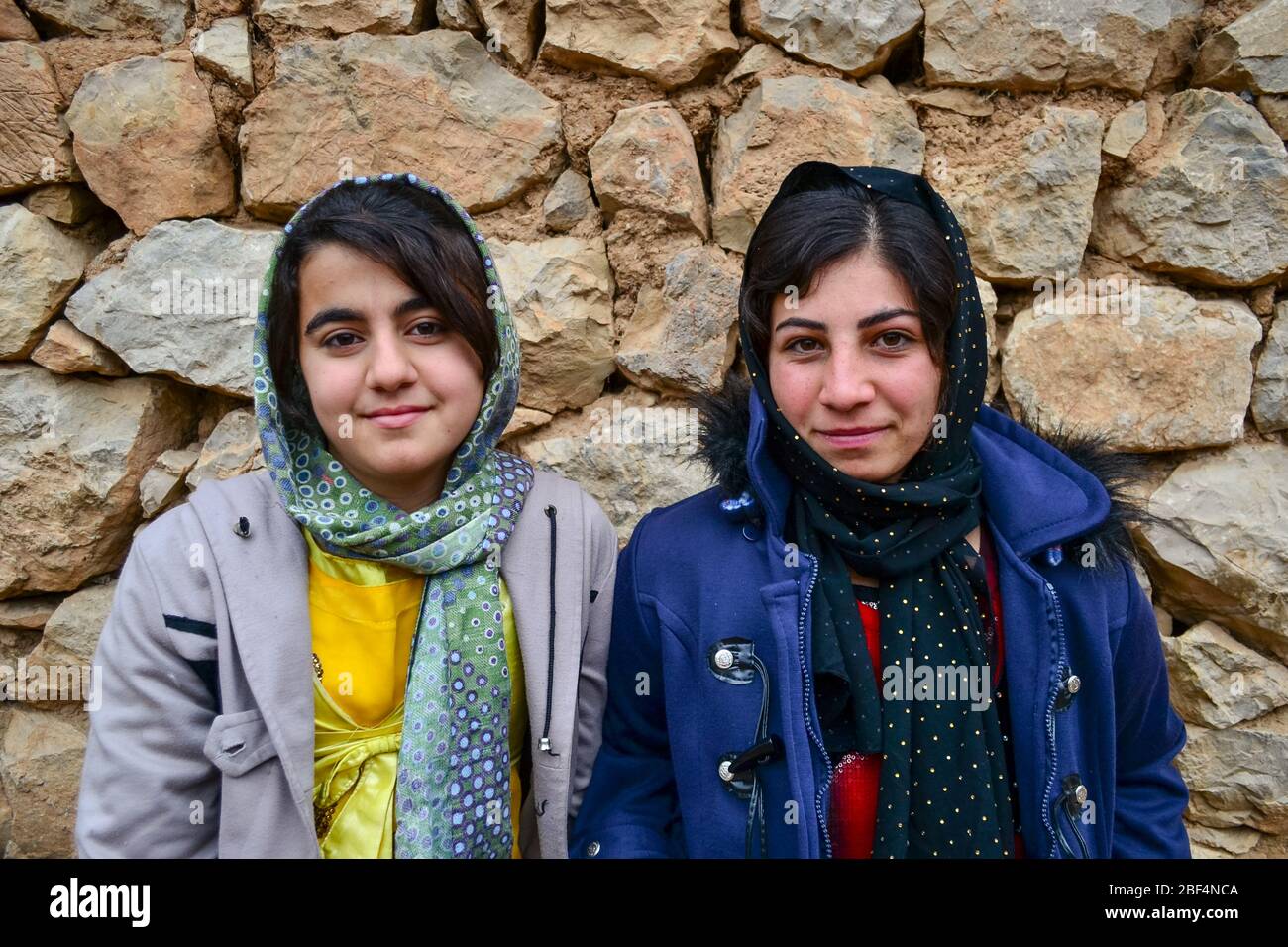 Palangan, Iranian Kurdistan - November 15, 2013: Portrait of two Muslim Kurdish sisteres with ...