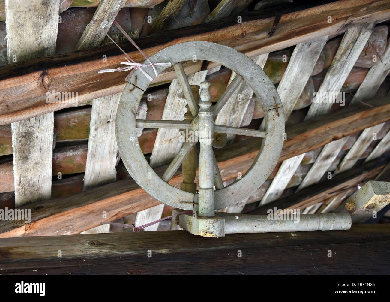 Antique wooden spindle Stock Photo - Alamy