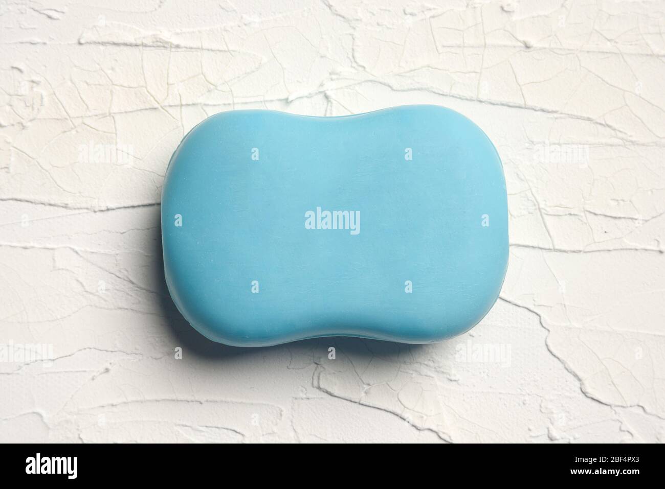 Blue Color Soap Isolated on Texture Crack White Background Stock Photo ...