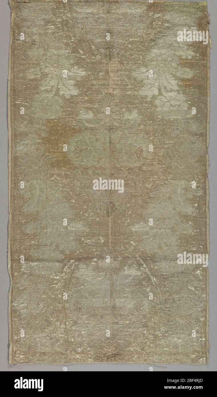 Fragment. Single panel of silver and white metal cloth. Design of broad ...